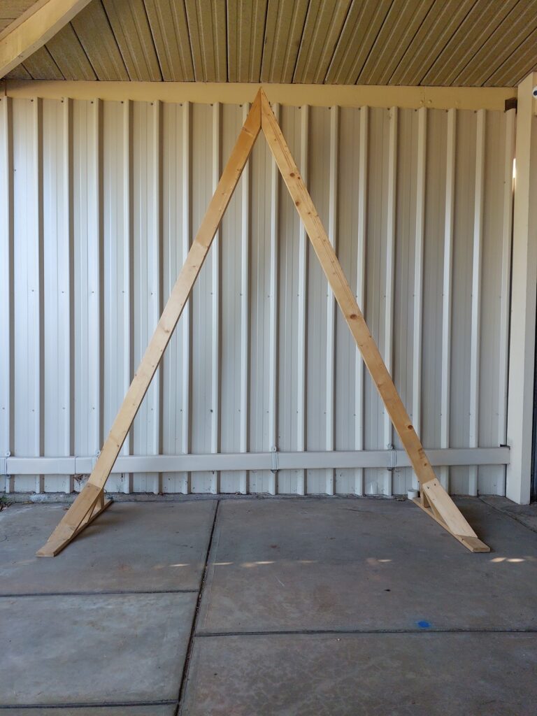 Triangle arch in natural timber - Style To Hire Adelaide